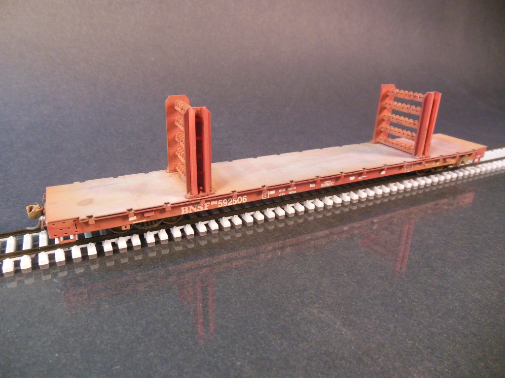 Atlas HO scale flat car with welded rail racks -Protoloads