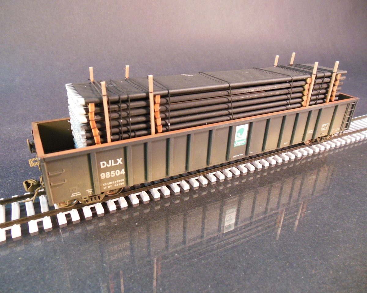 Exactrail HO scale gondola with drill pipe -Protoloads