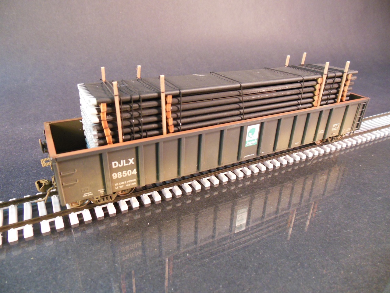 Exactrail HO scale gondola with drill pipe -Protoloads