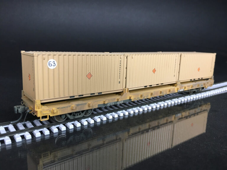Walthers HO scale 60’ flatcar with DODX containers -Protoloads